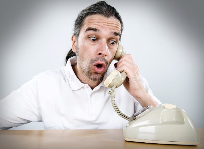 Shocked Man Talking on Mobile Phone Stock Image - Image of looking ...