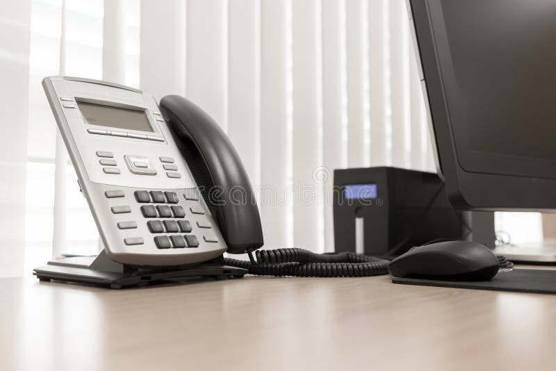 Telephone and Computer on Table Work Stock Image - Image of black ...