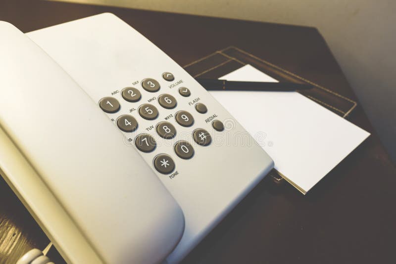 Telephone and Notebook on Table Stock Photo - Image of land, empty ...