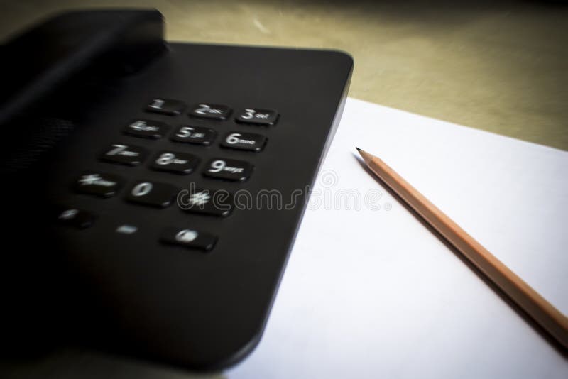 Telephone and paper stock image. Image of information - 68485477