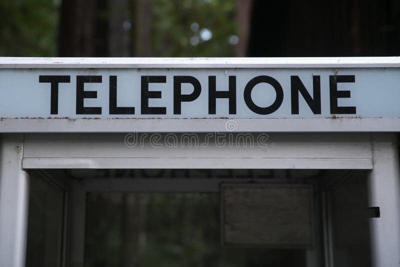 Telephone Sign at Top of Telephone Booth Stock Image - Image of sign ...