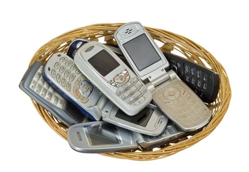 Telephones in basket 1 stock photo. Image of isolated - 12356748