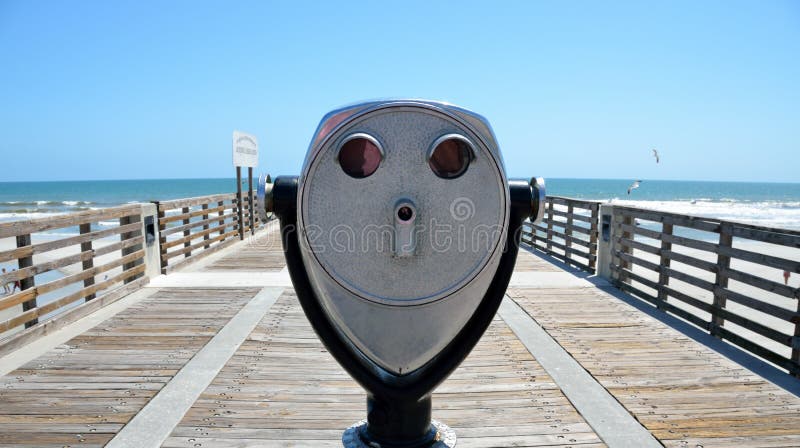 Telescope on pier stock image. Image of magnification - 24981877