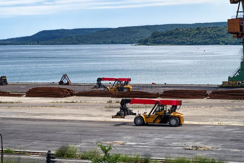 Telescopic Handlers Working on a Shipping Warehouse. Day View Stock ...