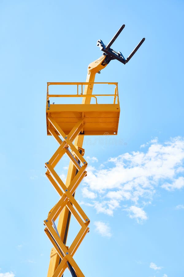 Telescopic Mobile Crane and Construction Scissor Lift Stock Image ...