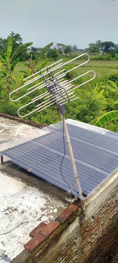 The Television Antenna Must Be Placed on the Roof of the House Stock Photo - Image of roof ...
