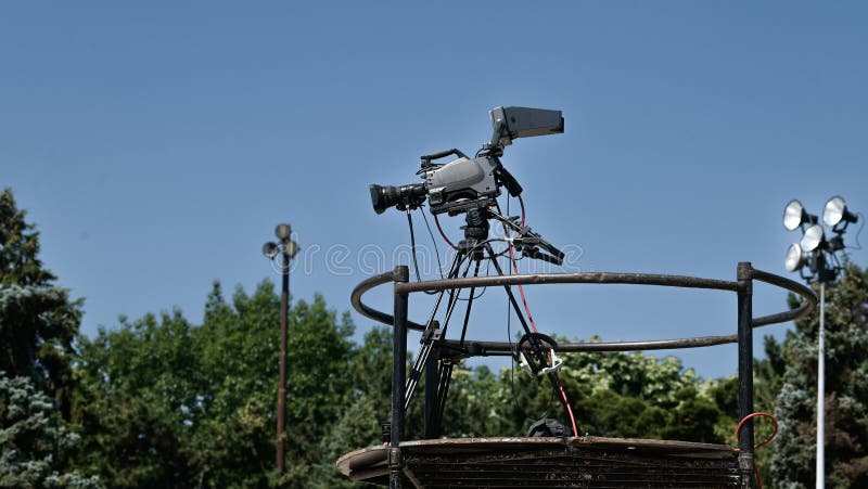 Television Broadcast Camera System Standing on a Tripod for Live Stock ...