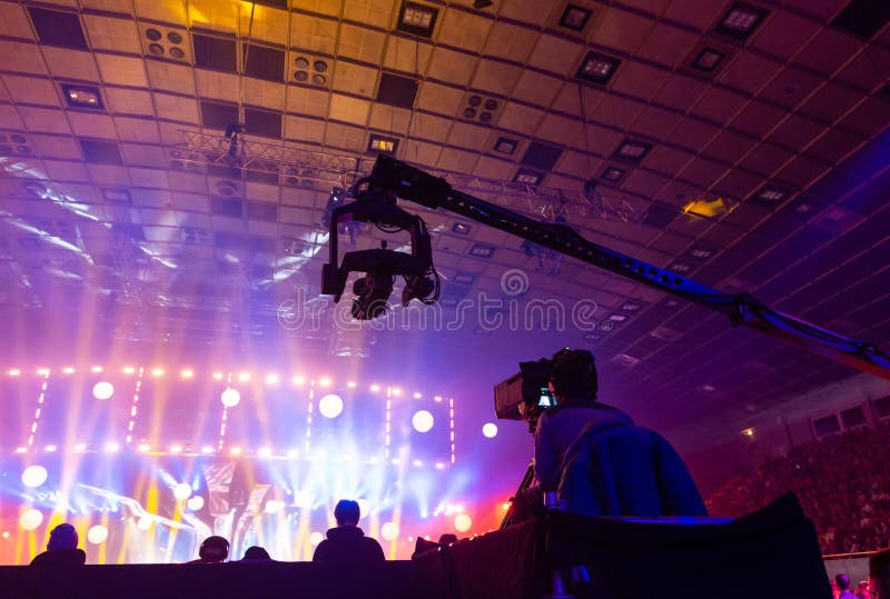 Television Broadcast by a Cameraman during a Concert. Camera with the ...