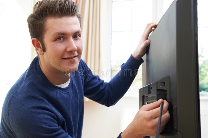 Television Engineer Installing New Television at Home Stock Image ...