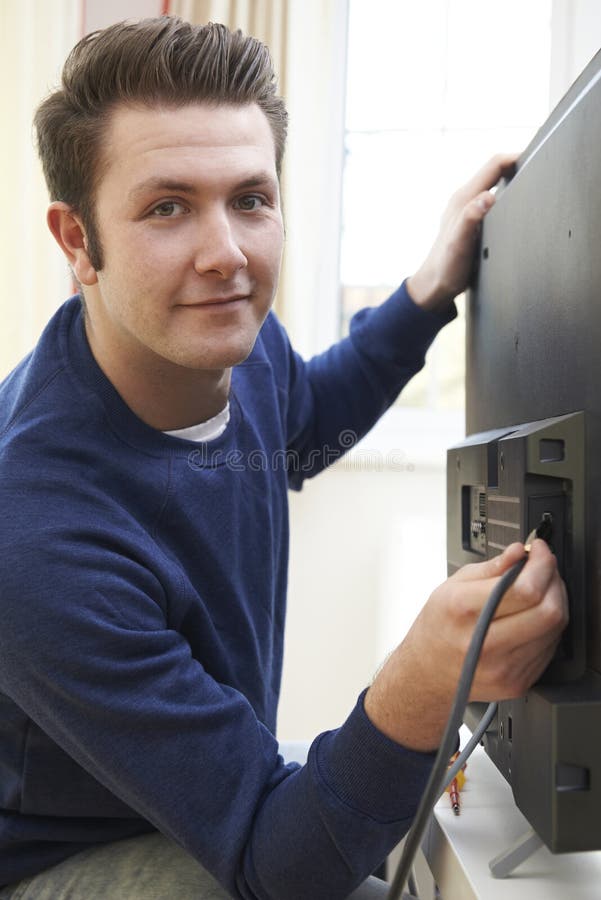 Television Engineer Installing New Television at Home Stock Image ...