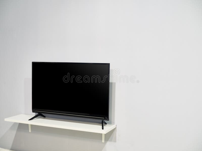 A Television Set with a Big Blank Wall Stock Photo - Image of ...