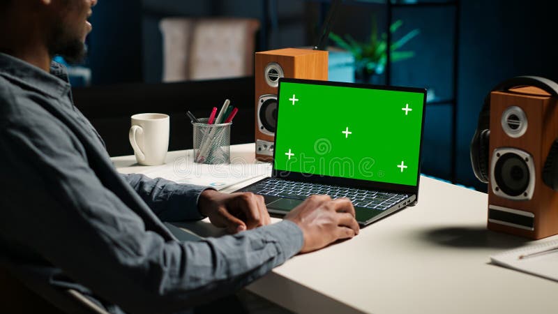 Teleworker at Home Editing Documents Next To Mockup on His Laptop Stock ...