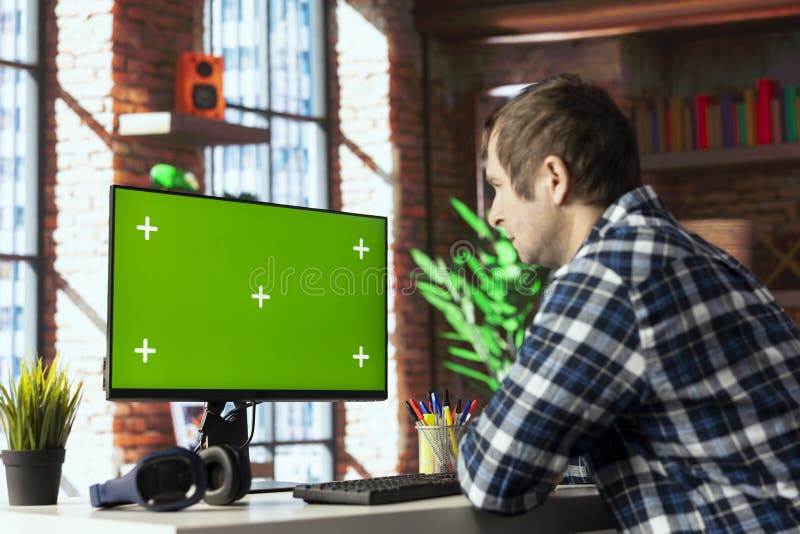 Teleworker in Home Office Editing Documents on Mockup Computer Stock ...