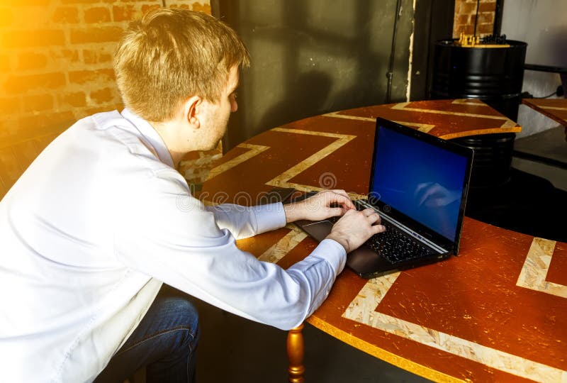 Male Teleworker Texting Using Laptop and Internet, Working Online ...