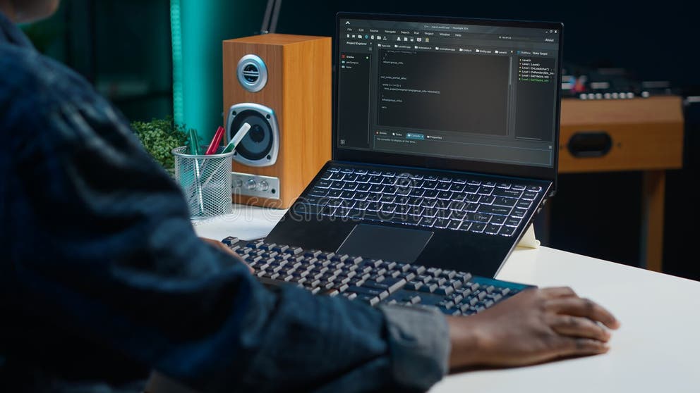 Teleworker Using Laptop To Do Coding for Software Developing Stock ...