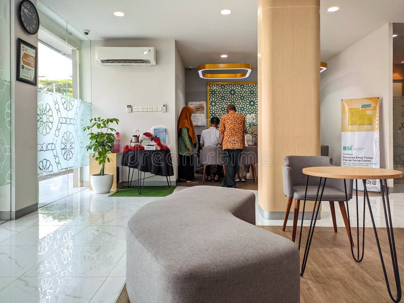Teller Counter at Bank Syariah Indonesia (BSI). Bank BSI Employees are ... Teller Counter at Bank Syariah Indonesia (BSI). Bank BSI Employees are ...