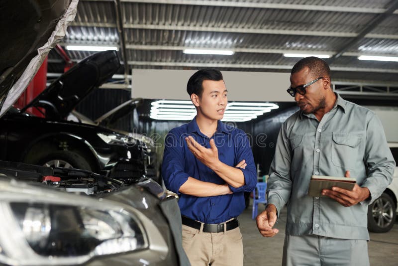 Telling Mechanic Car Problems Stock Image - Image of explain, breakdown ...