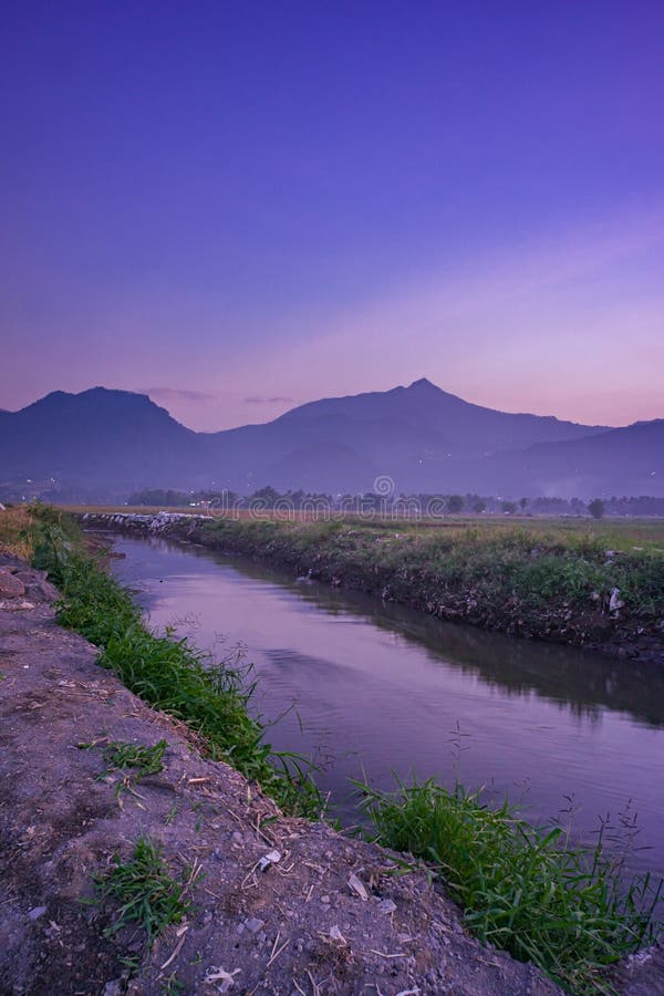 Telomoyo mountain in java stock image. Image of sunrise - 250660059