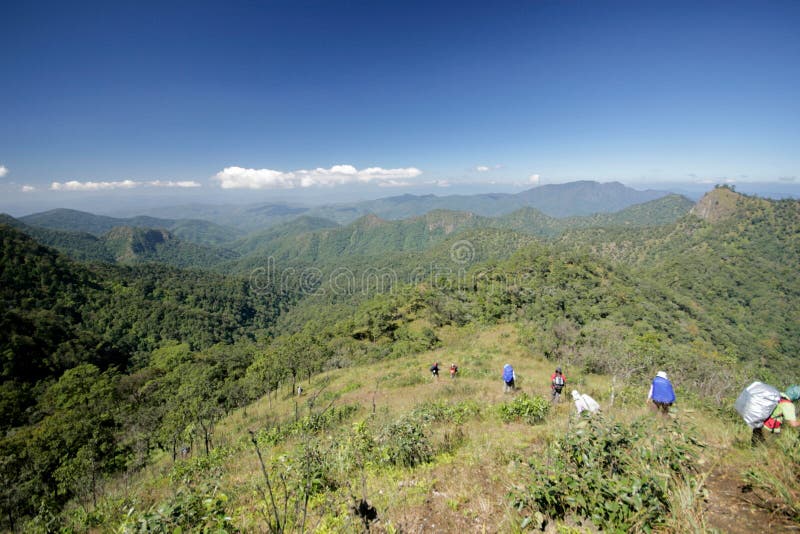Tem of Trek Go To Summit of Mountain Stock Image - Image of active ...