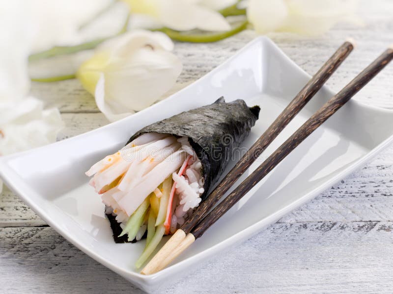Temaki Sushi Hand Roll with Crab Meat Sticks Wrapped in Mamenori ...