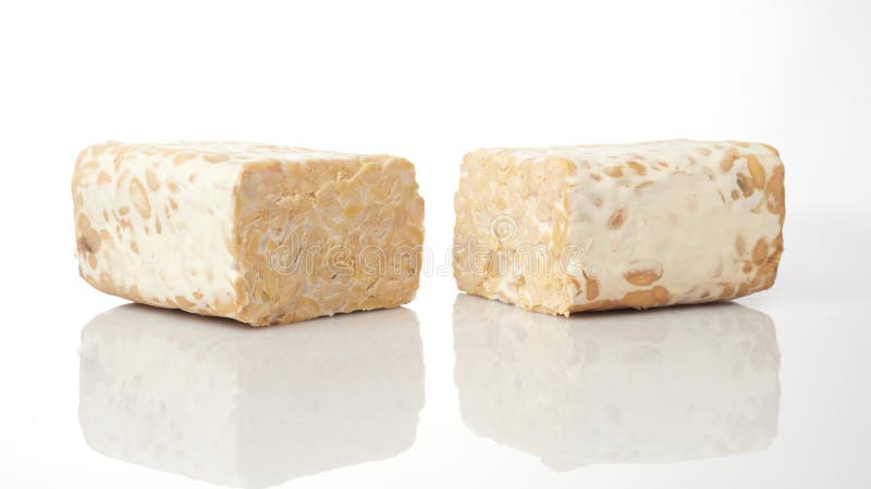 Tempeh Blocks Isolated in White Background Showcasing Texture and Color ...
