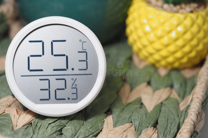 Temperature and Humidity Display on a Decorative Table Setting Stock ...