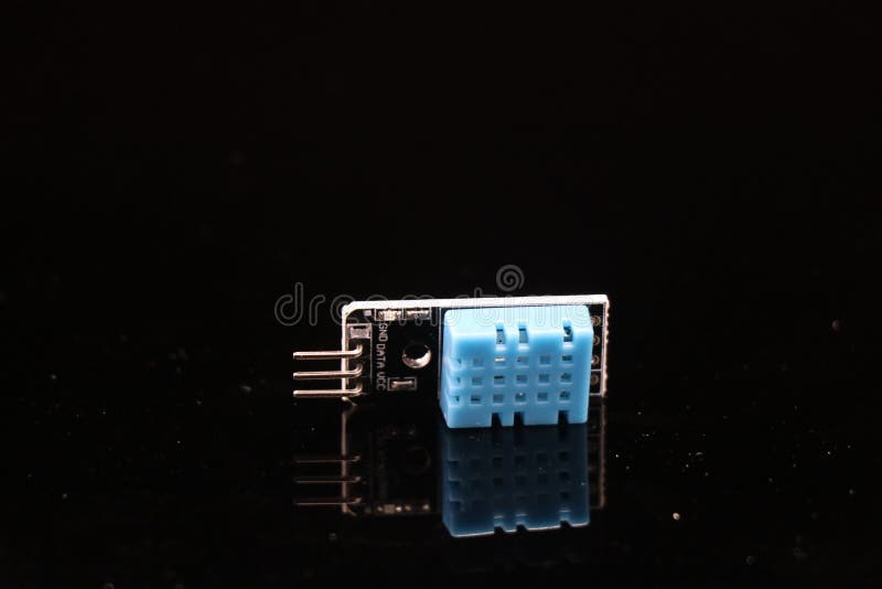 Temperature and Humidity Sensor Module or DHT11 Board Held in Hand ...