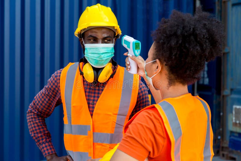 Temperature Screening and Medical Check at Container Cargo Site. Worker ...
