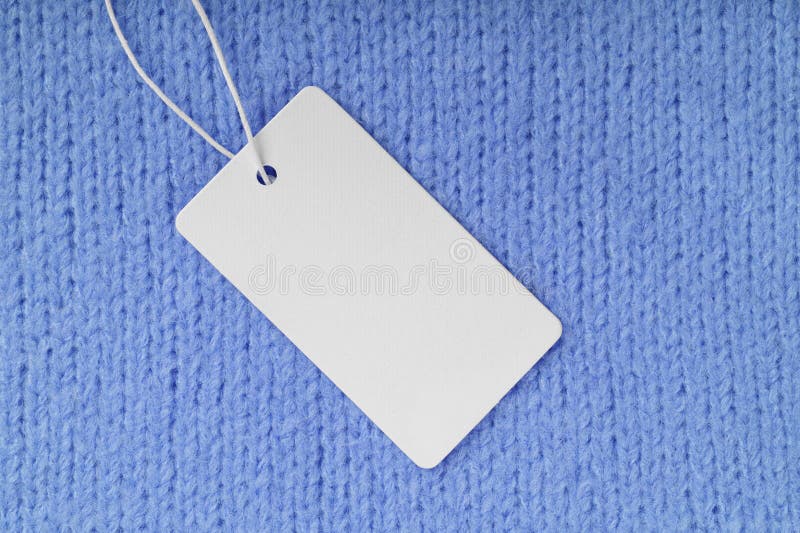 Template of Blank Clothing Label, Price Tag on Blue Knitted Sweater ...
