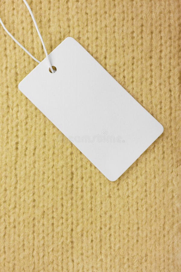 Template of Blank Clothing Label, Price Tag on Yellow Knitted Sweater ...