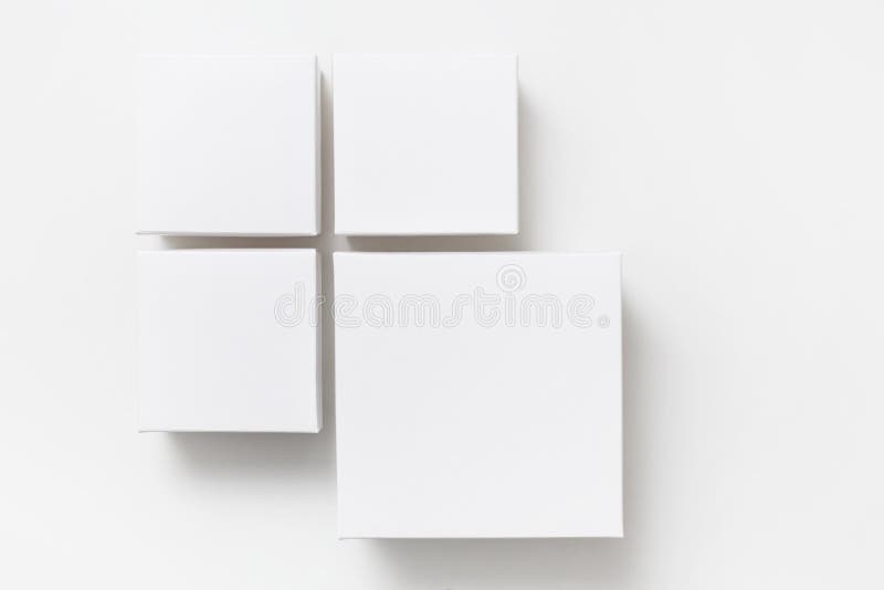 Mock Up of Four Different Size White Boxes on the White Background ...
