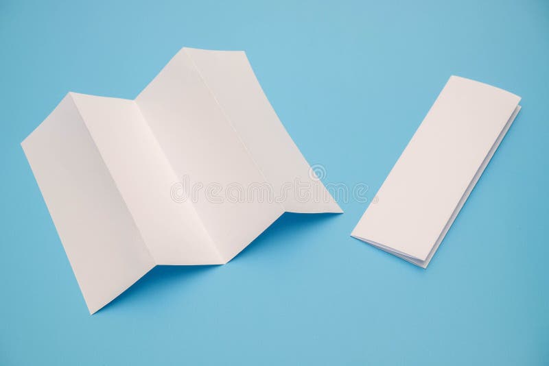 Template Fold White Paper on Blue Background Stock Image - Image of ...
