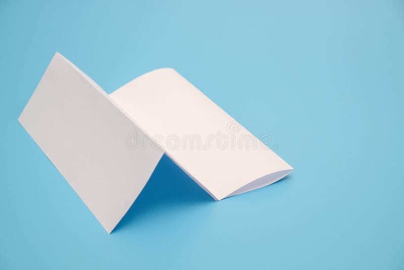 Template Fold White Paper on Blue Background Stock Image - Image of ...