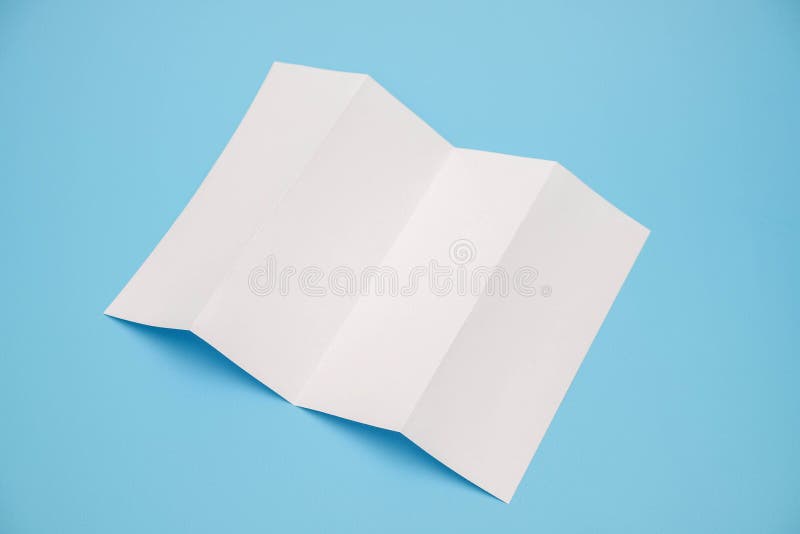 Template Fold White Paper on Blue Background Stock Photo - Image of ...