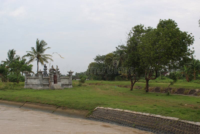 Temple on the Edge of Irrigation Stock Photo - Image of seputih, temple ...