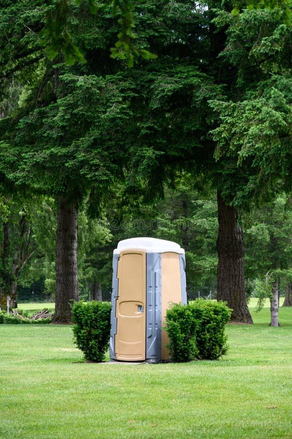 Temporary Plastic Outhouse in a Park Like Setting Stock Photo - Image ...