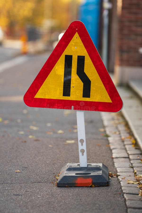 Temporary Road Sign Warning for Narrow Road Ahead.. Stock Photo - Image ...