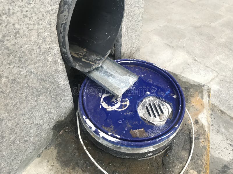 Temporary Setup of Drainage System Using Empty Paint Can and an Floor ...