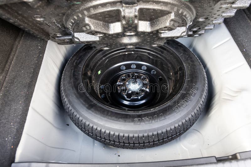 Temporary Spare Tire in the Car Boot for Emergency Use Stock Image ...
