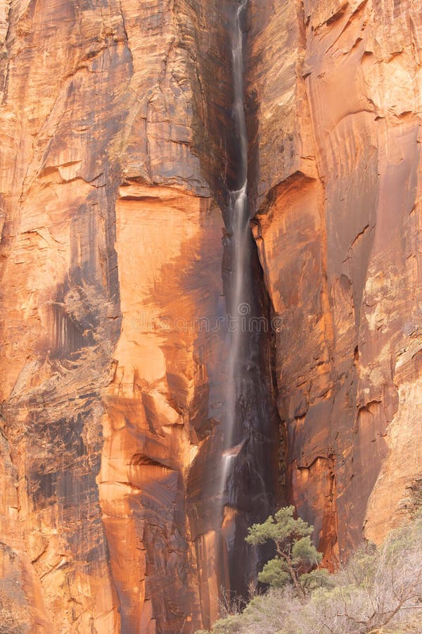 A Temporary Waterfall Over Red Sandstone Cliff Caused by Rain in Zion ...