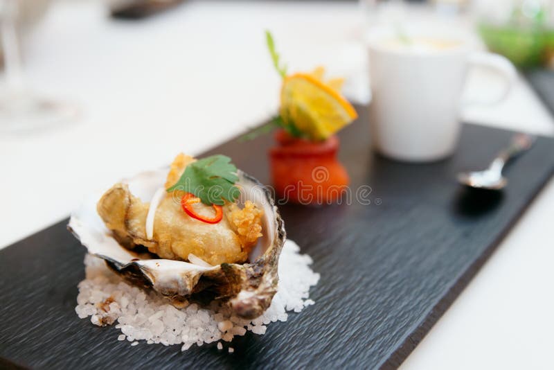 Tempura Fried Oyster in Shell Stock Image - Image of plate, rock: 47538881