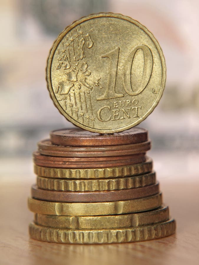 Ten Euro Cent Coin Balancing on a Top of Coins Stack. Stock Image ...