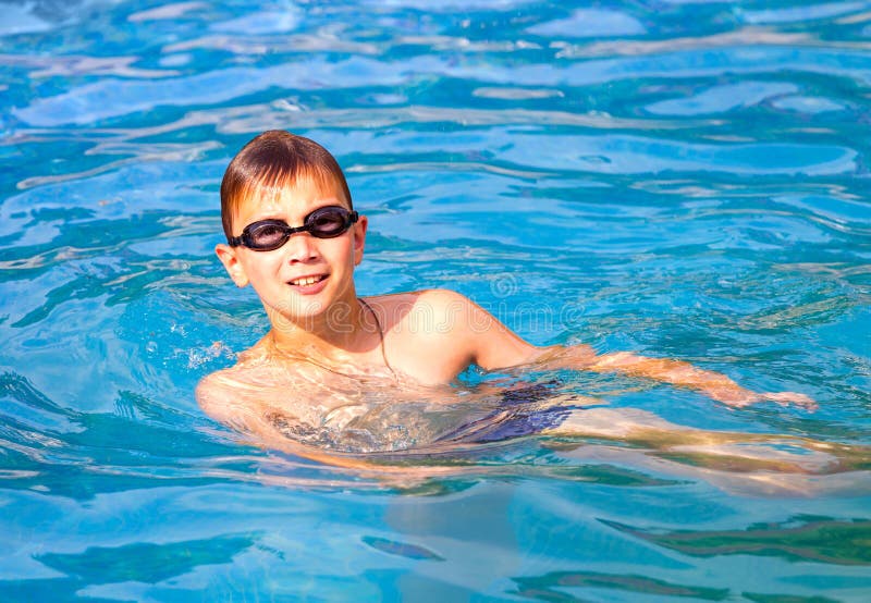 Ten Year Old Boy in Swimming Pool Stock Image - Image of playing ...