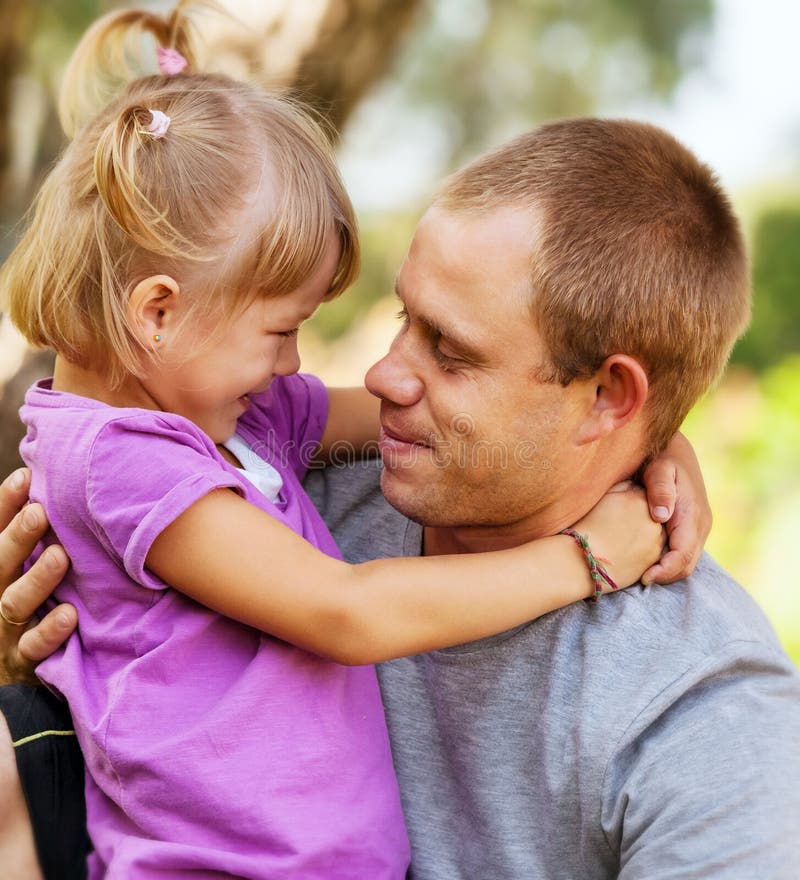 Father and Daughter Hugging Stock Photo - Image of expression ...