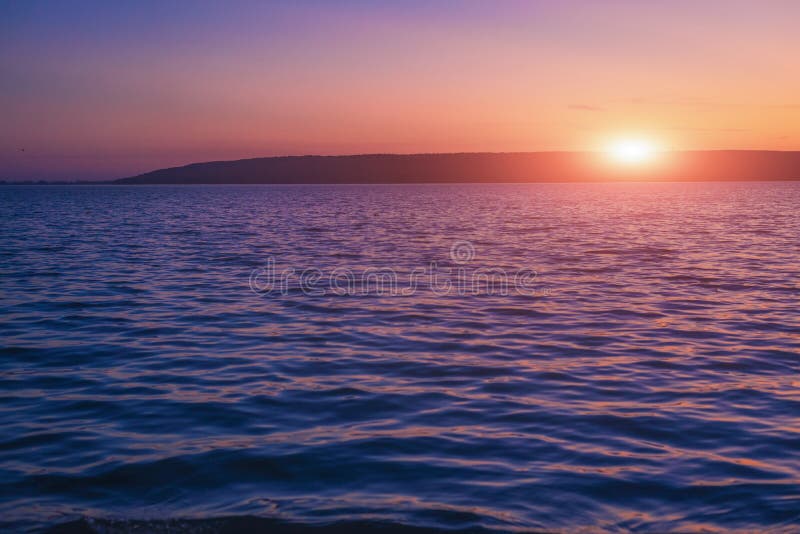 Tender Pink Sunset Above Dark Forest and Waves on River Stock Photo ...