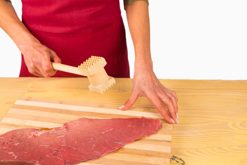 Tenderizing a steak stock image. Image of studio, slice - 29763867