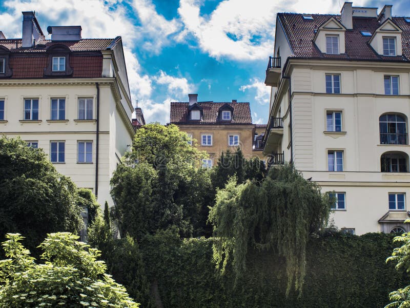 Tenements of the Old Town among Trees Stock Image - Image of facade ...