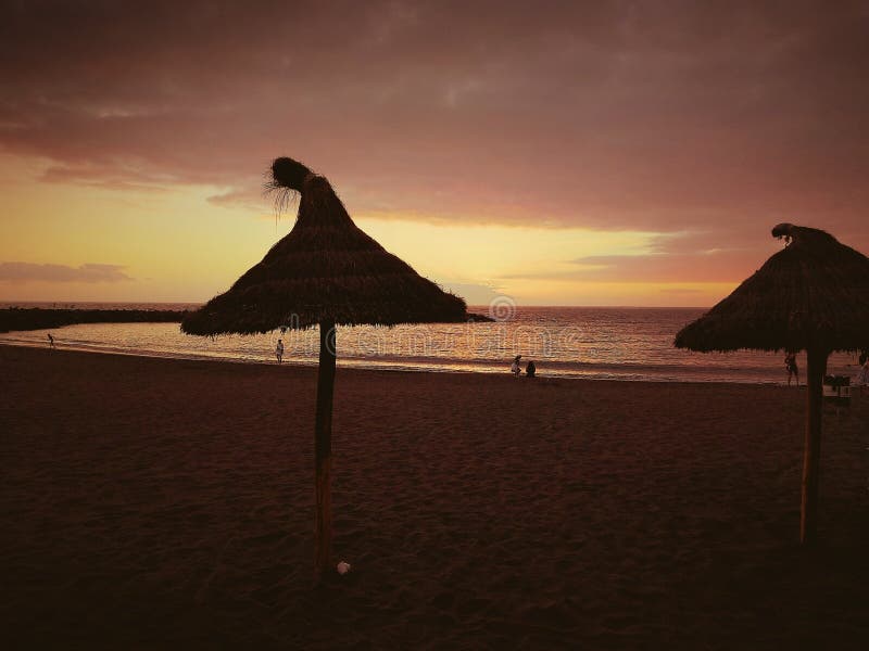 Tenerife Sunset in Ocean Side Stock Photo - Image of umbrellas ...