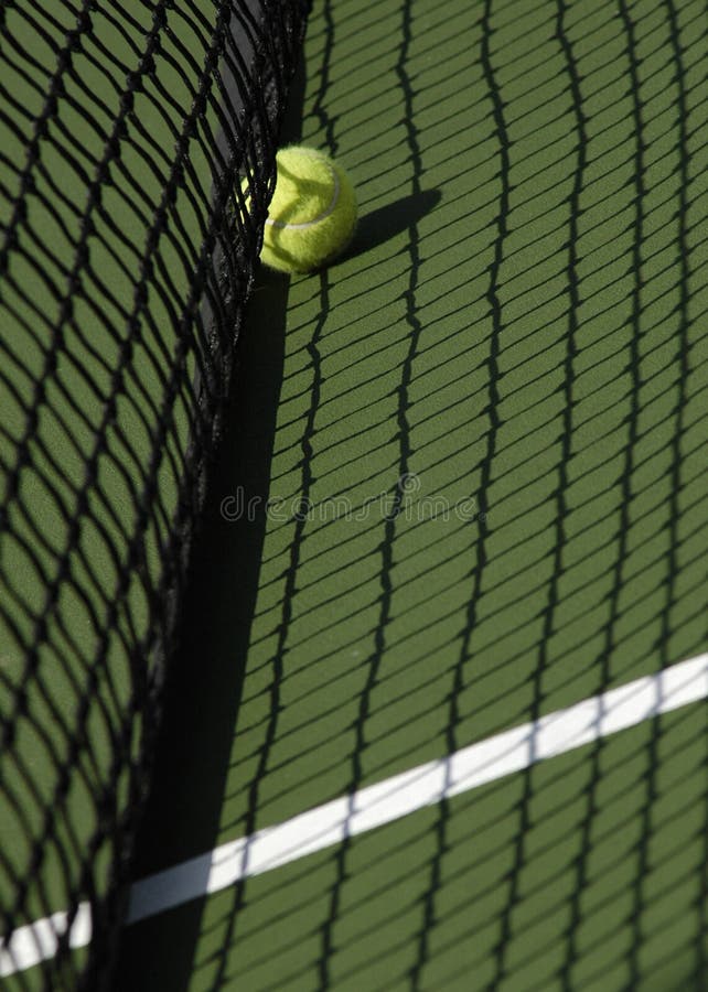 Tennis Ball On Court In Shadow Picture. Image: 2393145