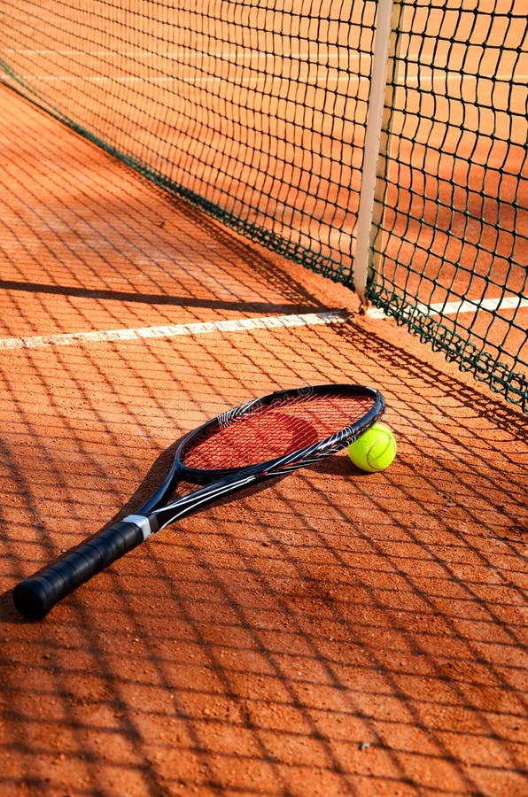 Tennis Ball and Racket are Near the Net Vertical Stock Image - Image of ...